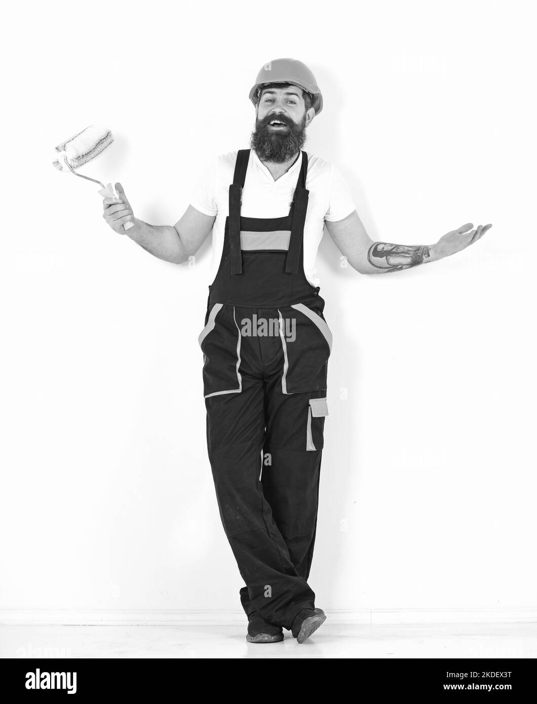 Cheerful painter in uniform Black and White Stock Photos & Images - Alamy