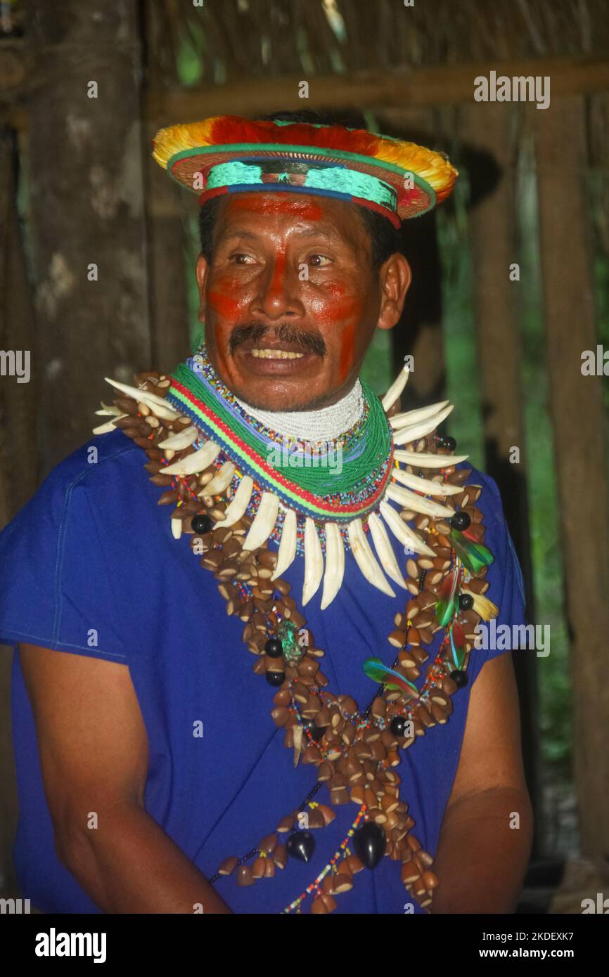 Siona shaman in traditional dress in an indigenous village in the ...