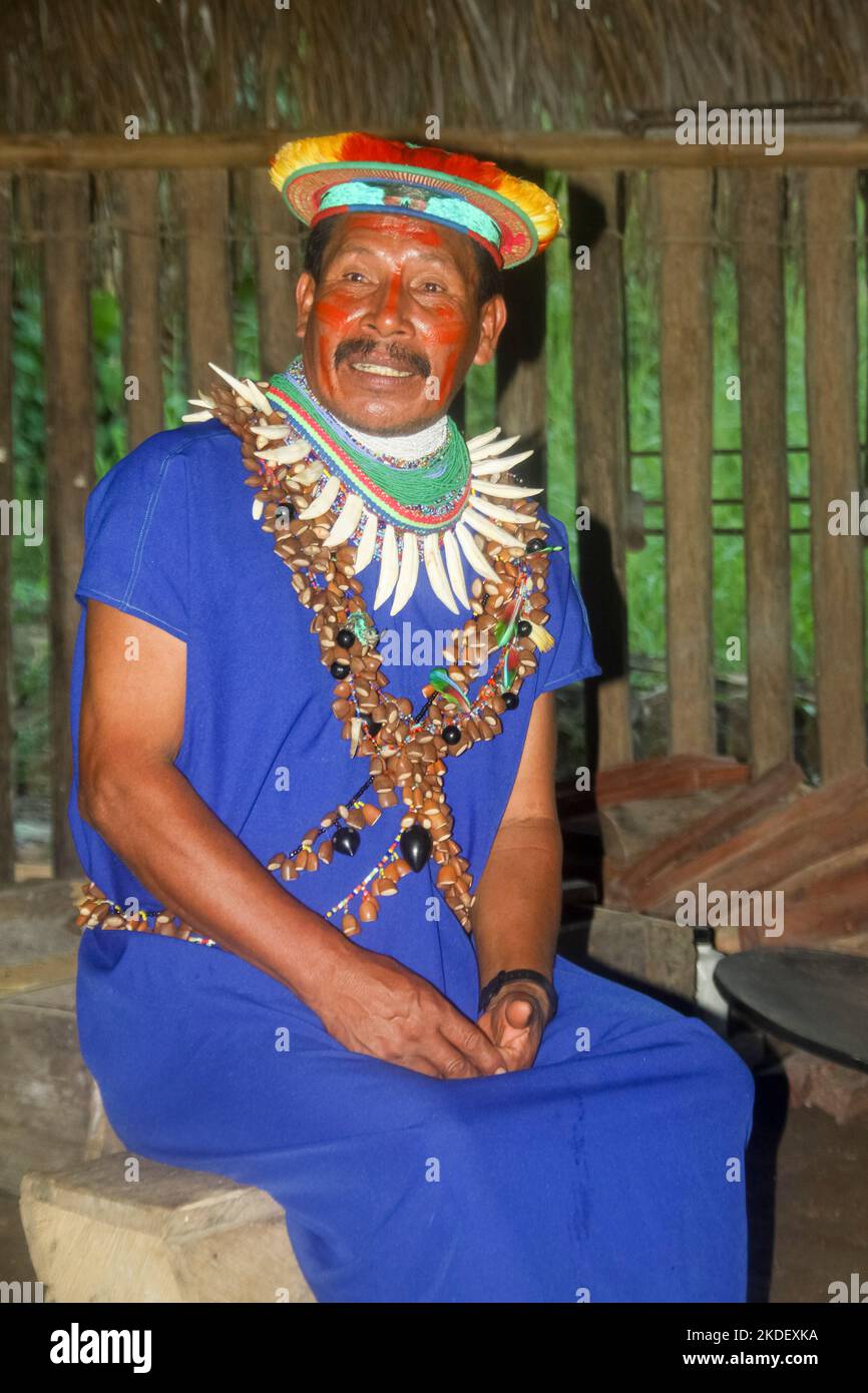 Siona shaman in traditional dress in an indigenous village in the ...