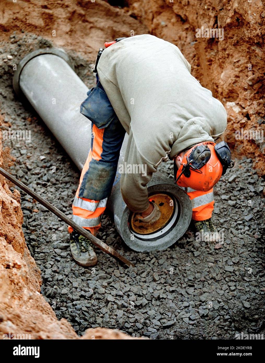 A business in a municipality. Excavation in a street for new pipes and ...