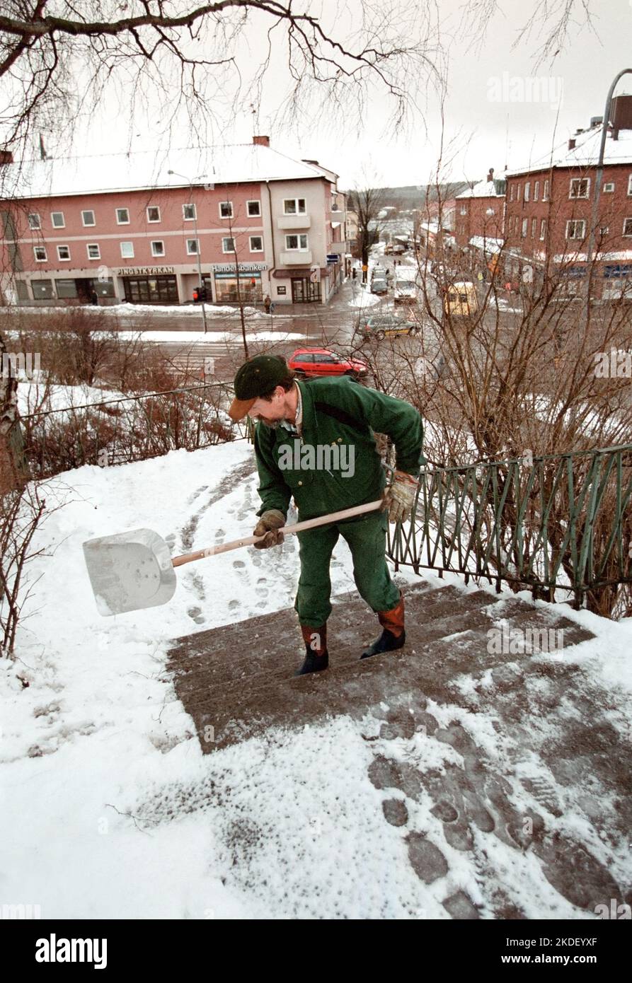 A business in a municipality, a worker Stock Photo - Alamy