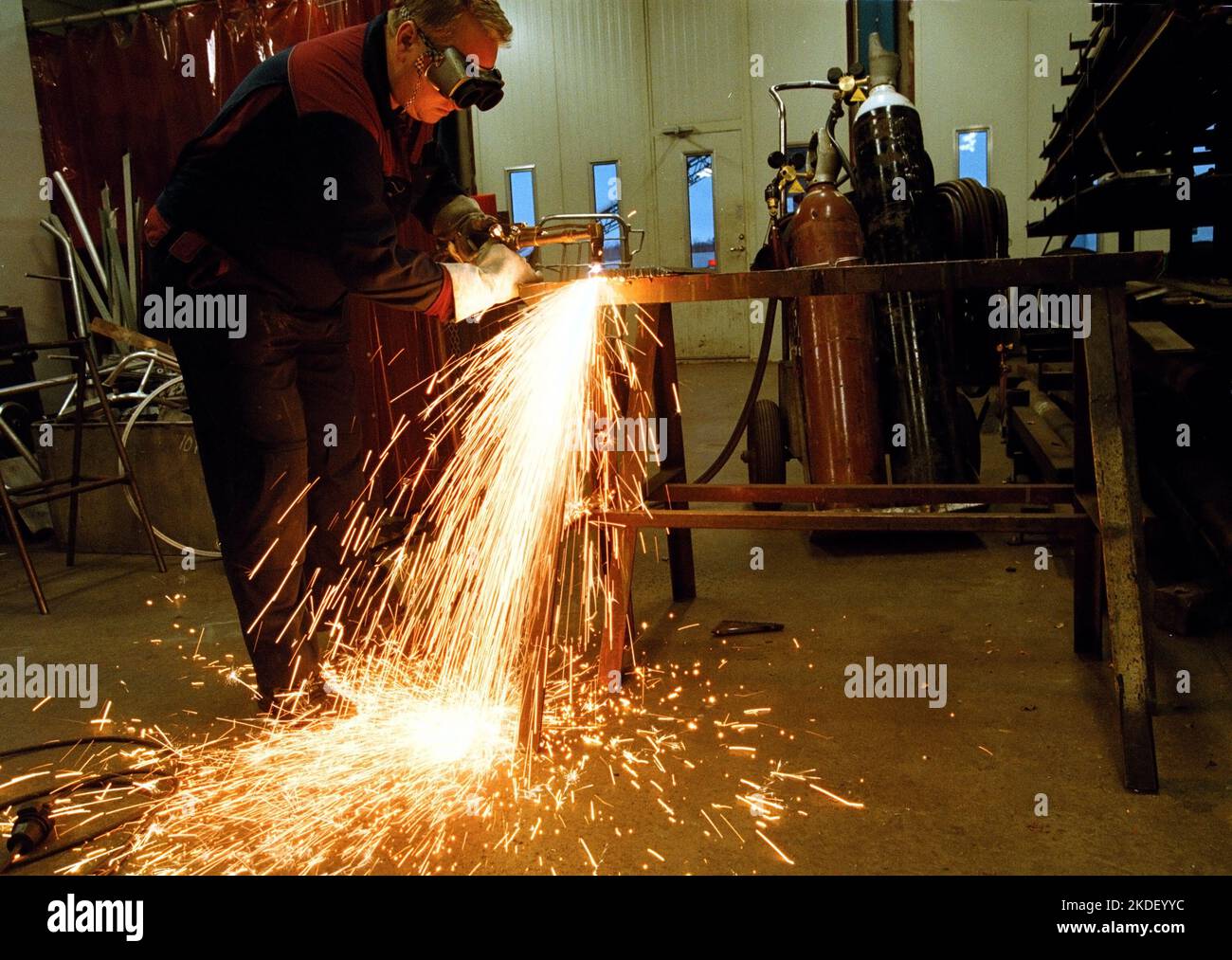 A business in a municipality, workers at a workshop Stock Photo - Alamy