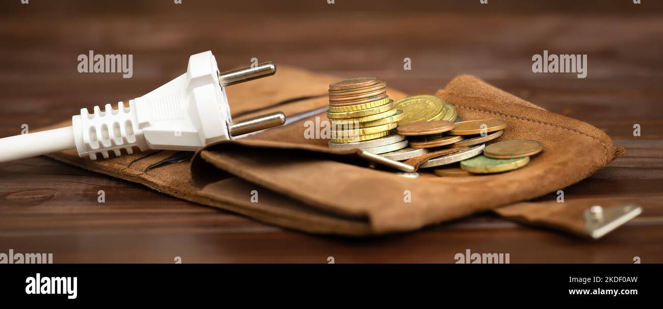 Energy plug money coins hi-res stock photography and images - Alamy