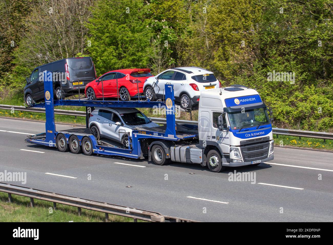 MANHEIM COX AUTOMOTIVE car transporter, commercial vehicle travelling ...