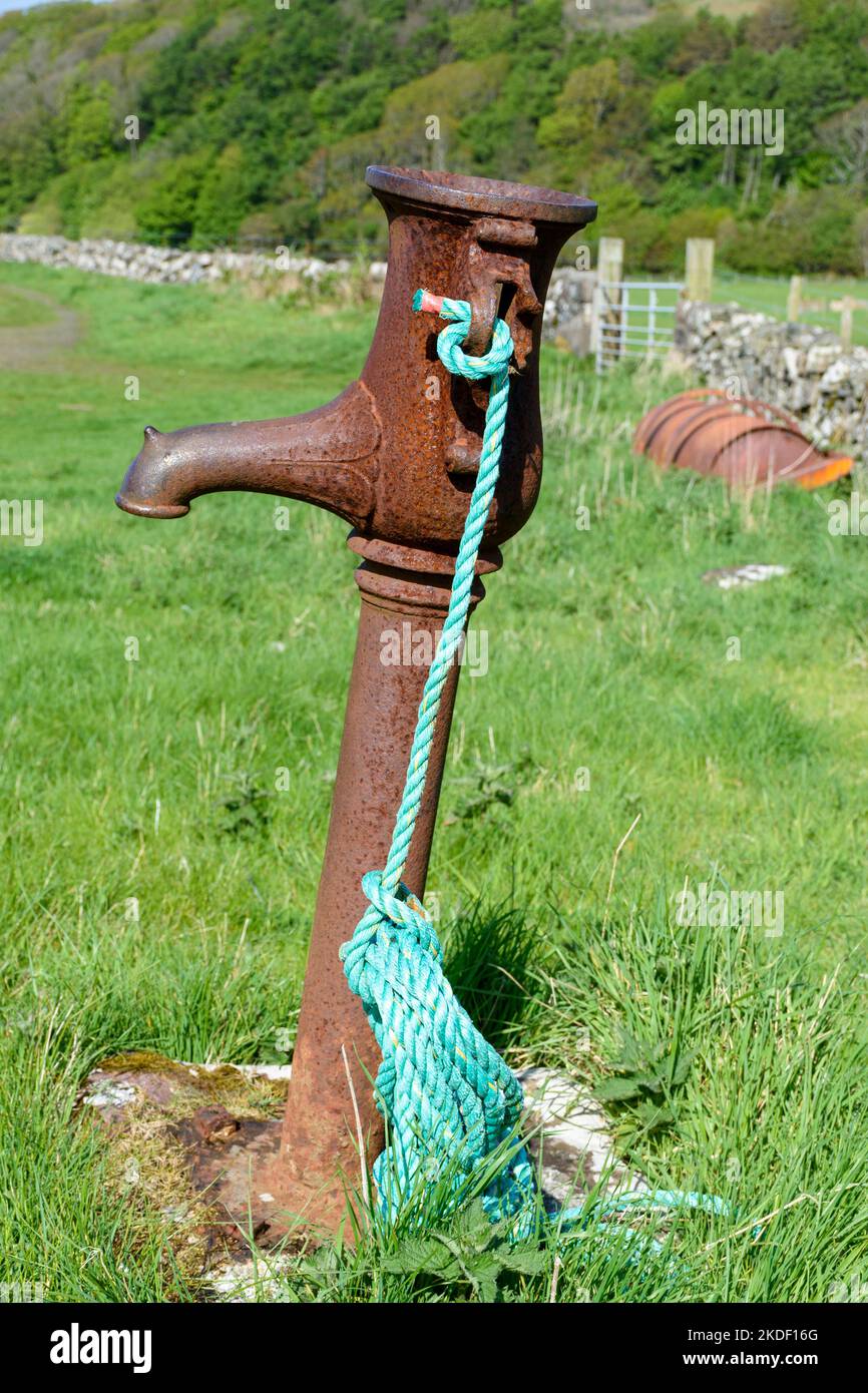 Old rusty water pump and rope, on the Isle of Canna, Scotland, UK Stock ...