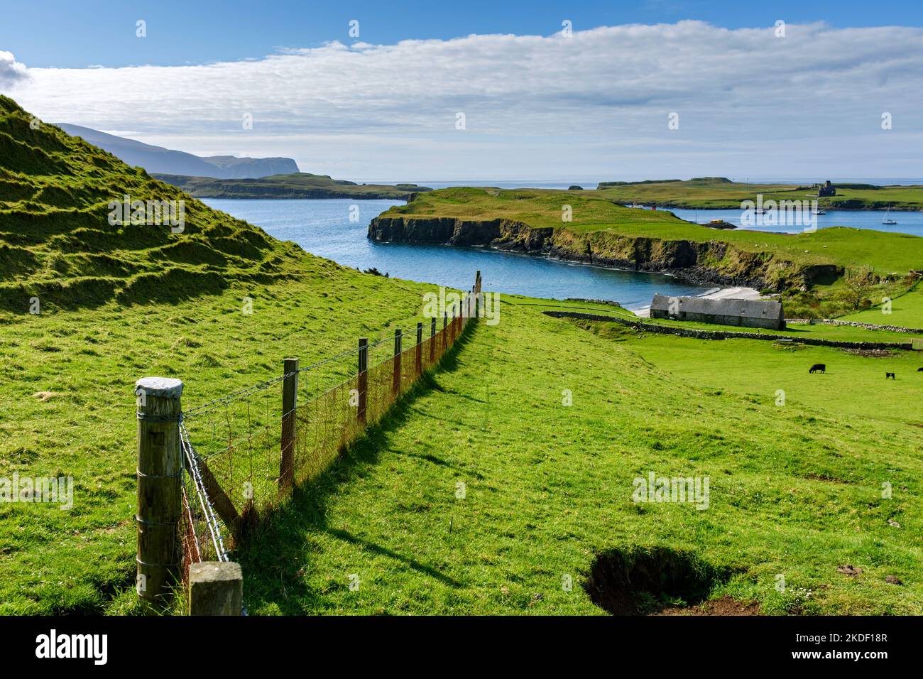 The island of Sanday over Canna Harbour from the slopes of Compass Hill ...