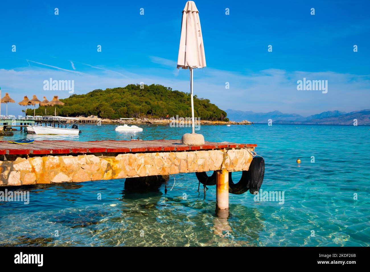 Bay in the Ksamil with ships and islands. Ionian Sea in Albania Stock ...