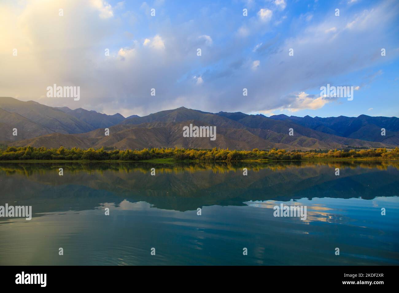 Lake in the mountains. Beautiful nature, reflection of clouds and ...