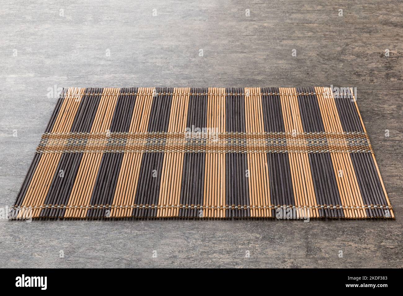 Perspective view of brown tablecloth for food on cement background ...