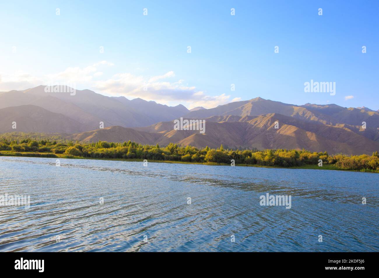 Lake in the mountains. Beautiful nature, reflection of clouds and ...