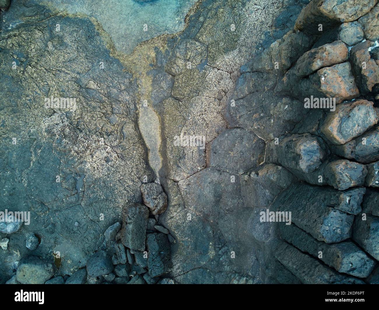 Abstract rocks volcanic Aerial view of the Atlantic Ocean in Caleta de ...
