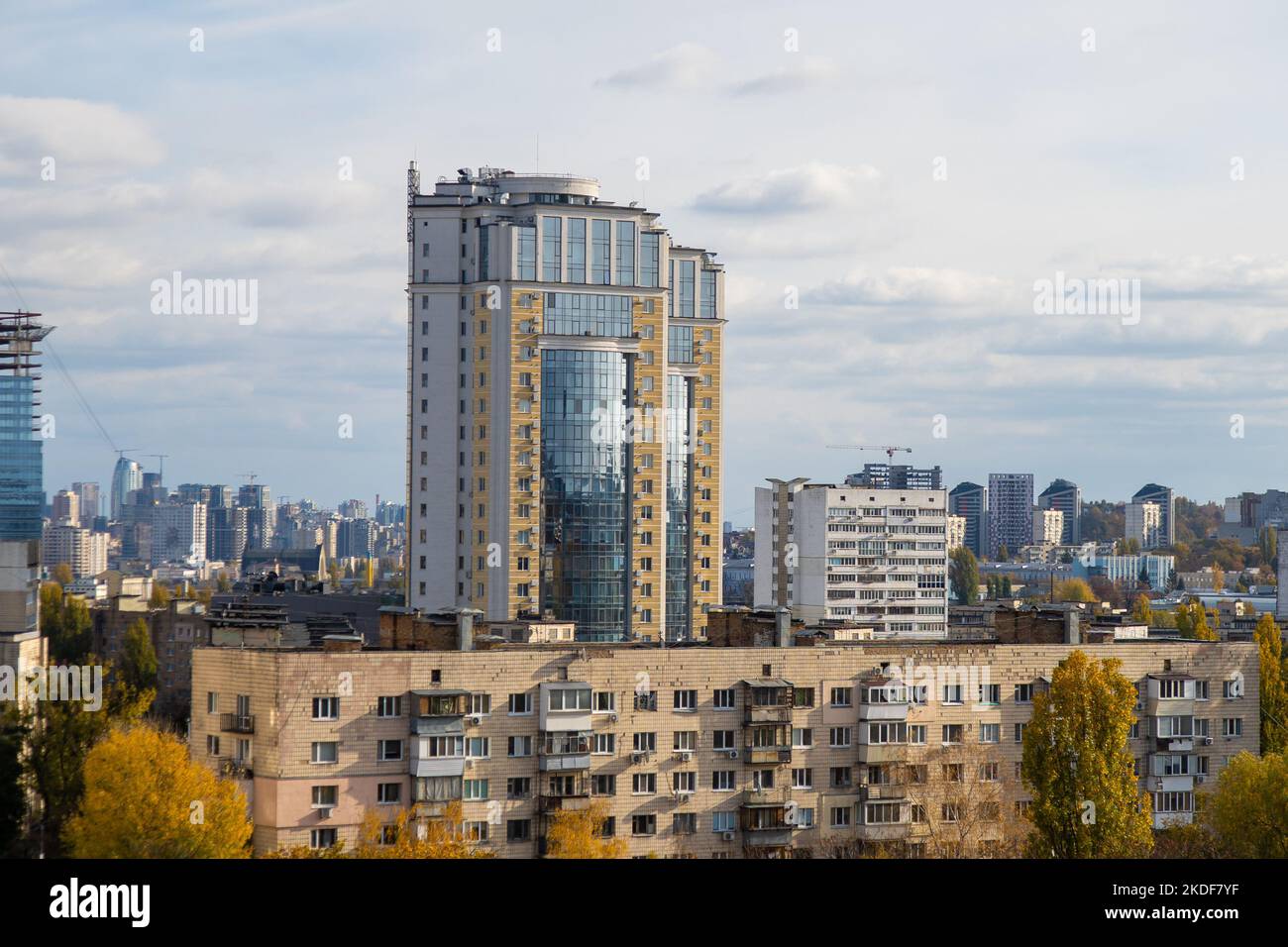 City building. Multi-storey residential building. Panorama of autumn ...