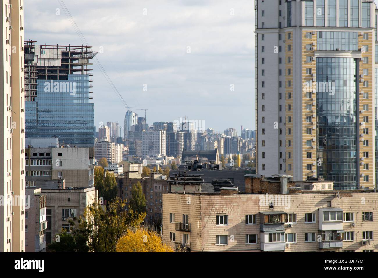 City building. Multi-storey residential building. Panorama of autumn ...