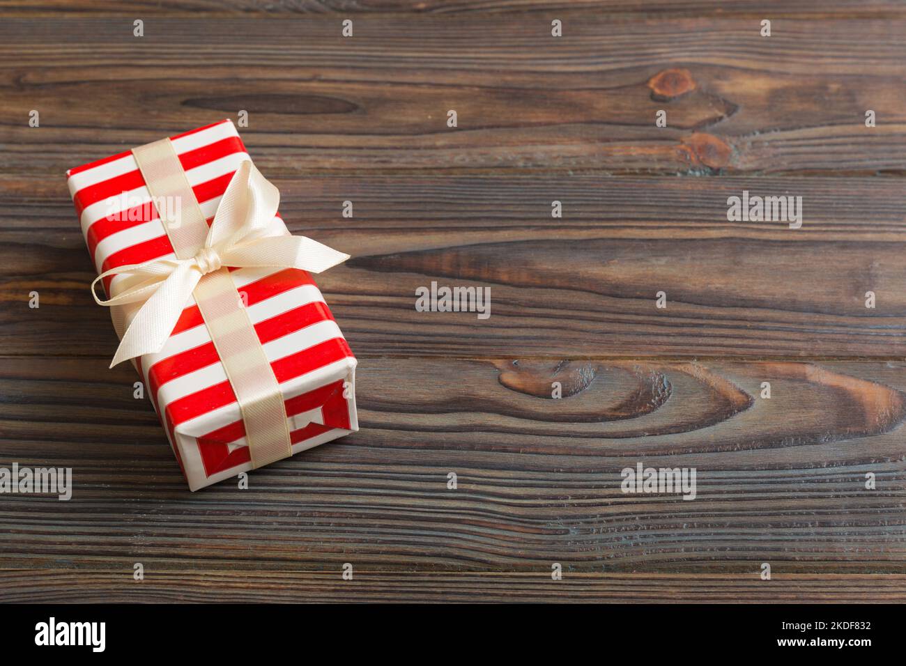 Wrapped christmas or other holiday handmade present in paper with ...