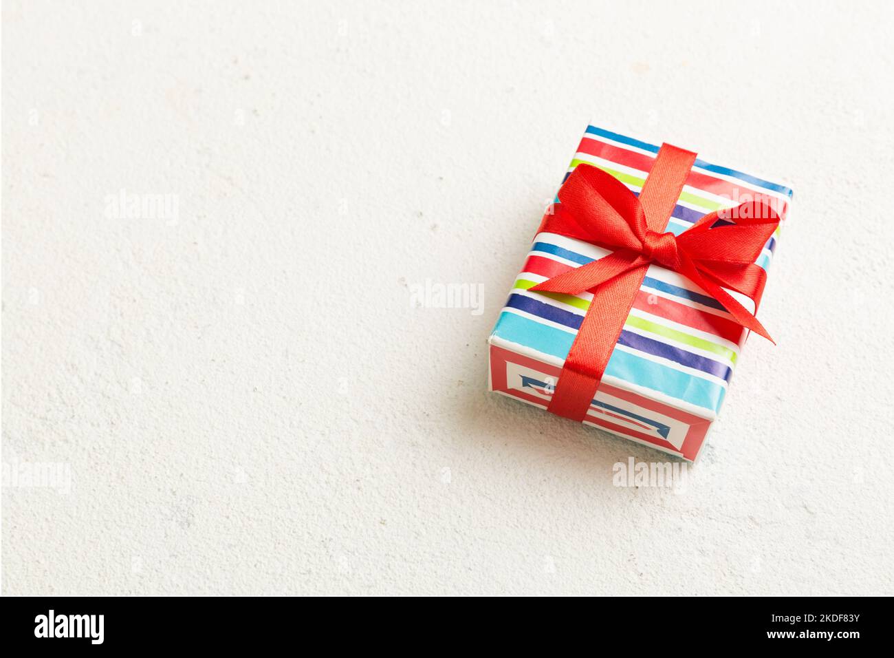 Wrapped christmas or other holiday handmade present in paper with ...