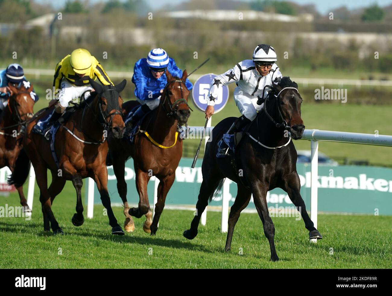 Wave Machine and jockey Yudish Geerdharry (right) on the way to winning ...