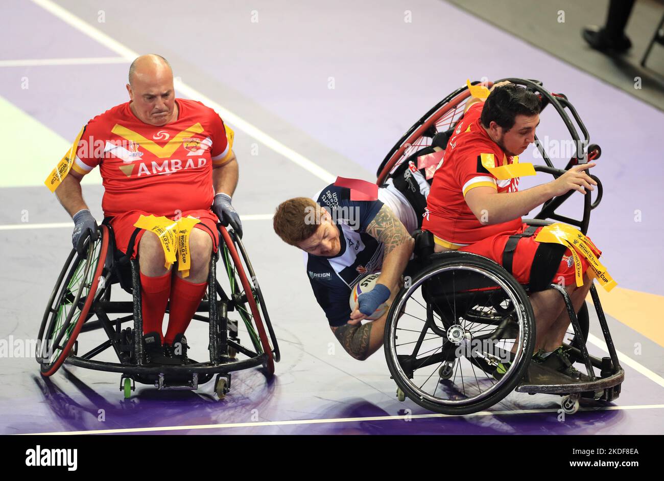 England's James Simpson (centre) in action with Spain's David Raymond ...