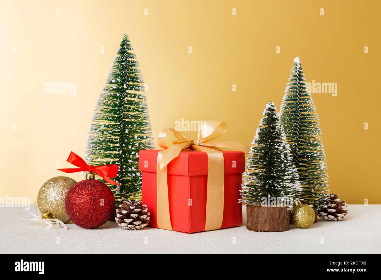 Christmas composition. craft Gift box, small tree, branches and craft ...