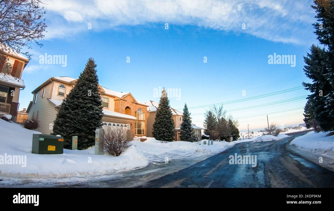 Driving in suburban area Stock Photo - Alamy