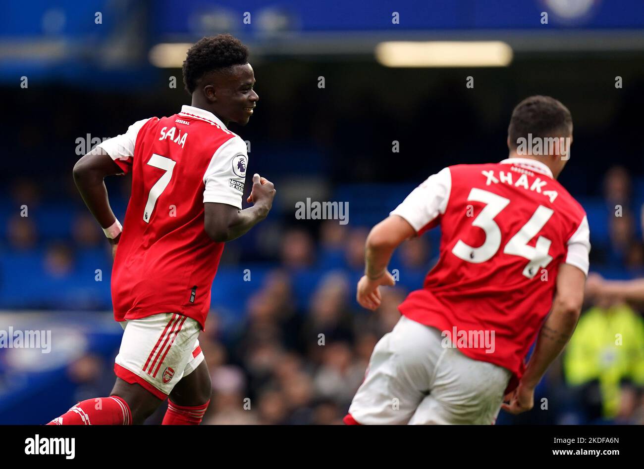 Arsenal's Bukayo Saka celebrates after his cross is turned into the net ...