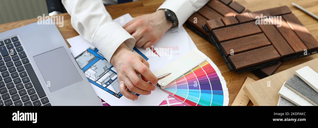 Interior designer working at project, palette on workplace Stock Photo ...