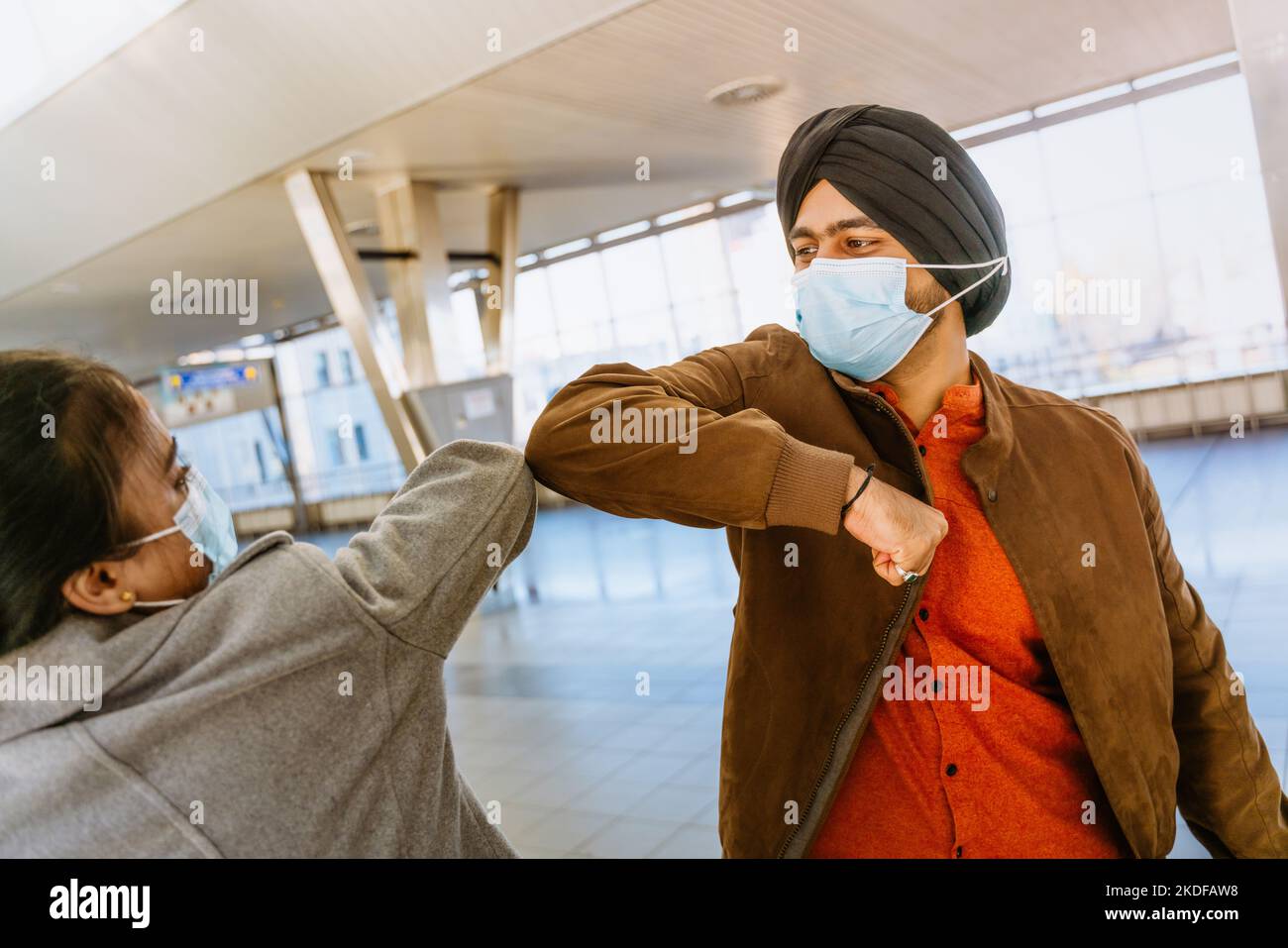 Elbow bump middle eastern hi-res stock photography and images - Alamy
