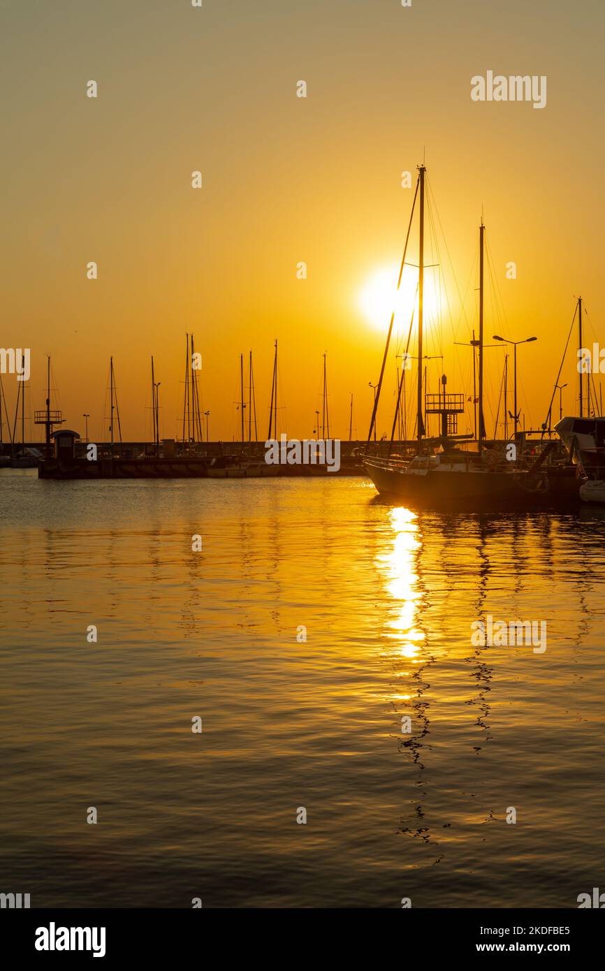 Sailing boat masts setting sun hi-res stock photography and images - Alamy