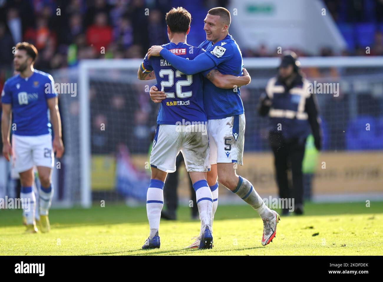 St Johnstone's Nicky Clark (right) and St Johnstone's Alex Mitchell ...