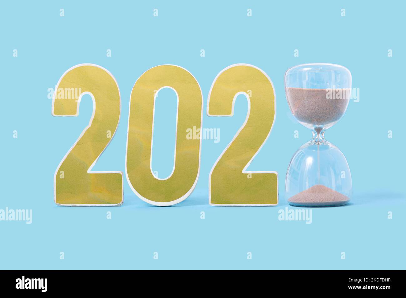 Combination of two and zero numbers with a sand clock at the end on the ...