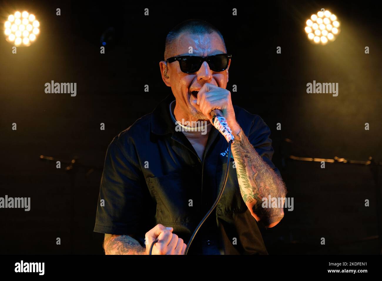 TBILISI, GEORGIA - OCTOBER 23, 2022: Male vocalist, singer holds a ...