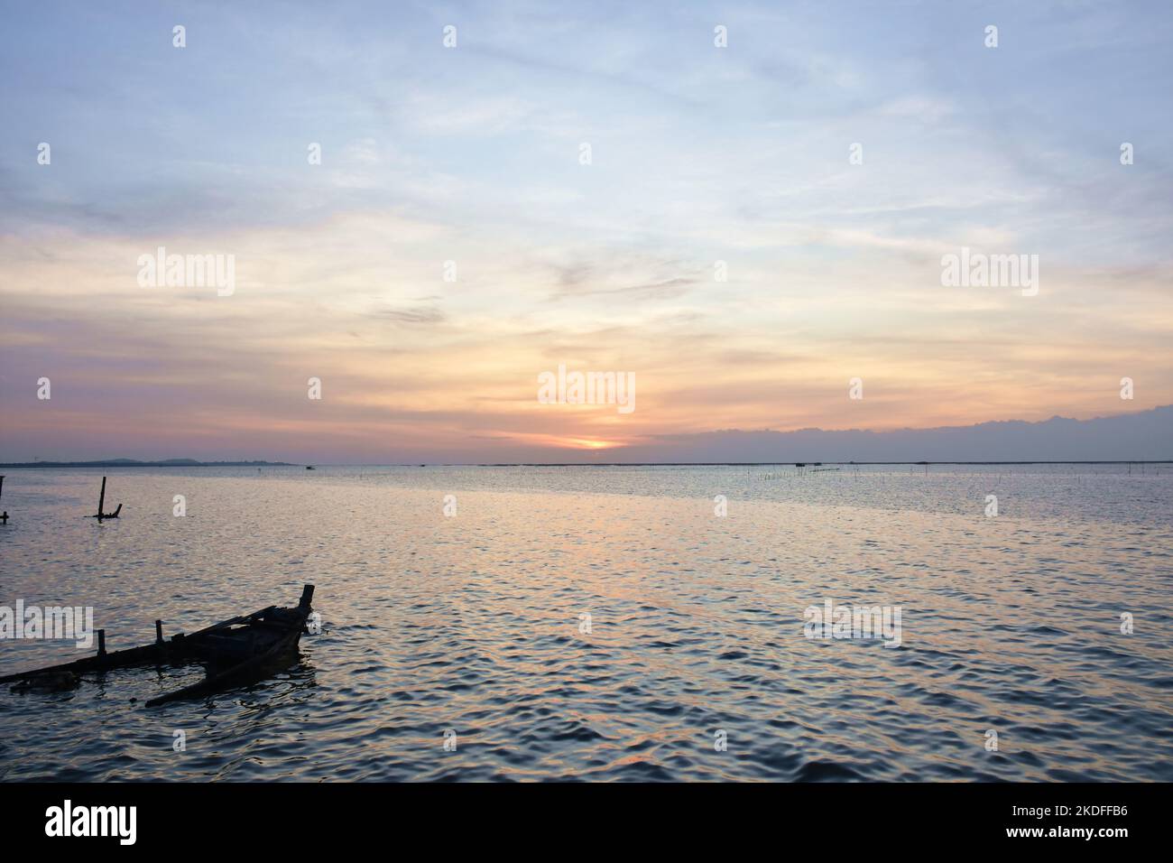 tree on beach and landscape of sea in sunset in Thailand Stock Photo ...