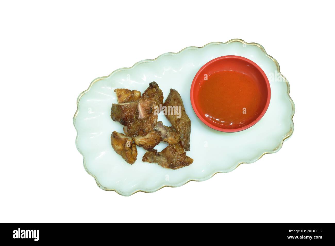 fried salty beef meat and belly arranging on plate dipping chili sauce ...