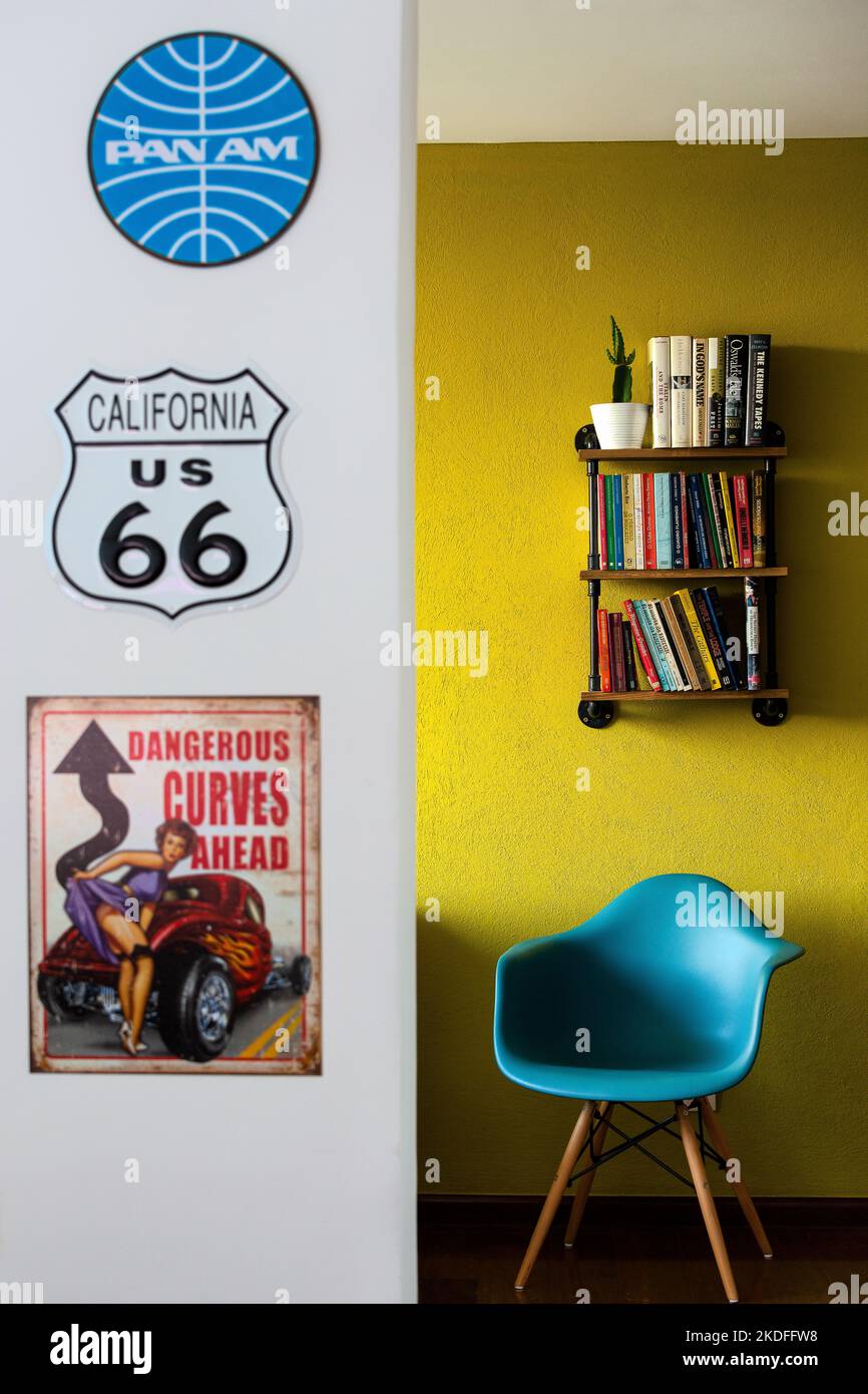 A vertical shot of a home interior in a modern style decor with sign ...