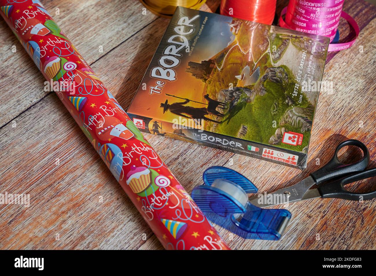 Berlin, Germany - September 25, 2022: Board game with wrapping paper ...