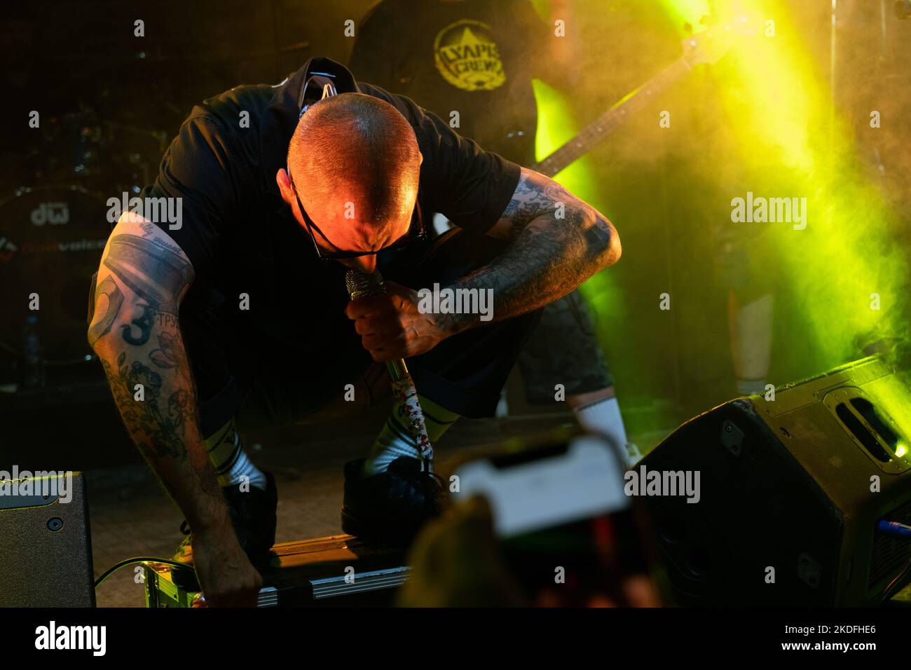TBILISI, GEORGIA - OCTOBER 23, 2022: Male vocalist, singer holds a ...
