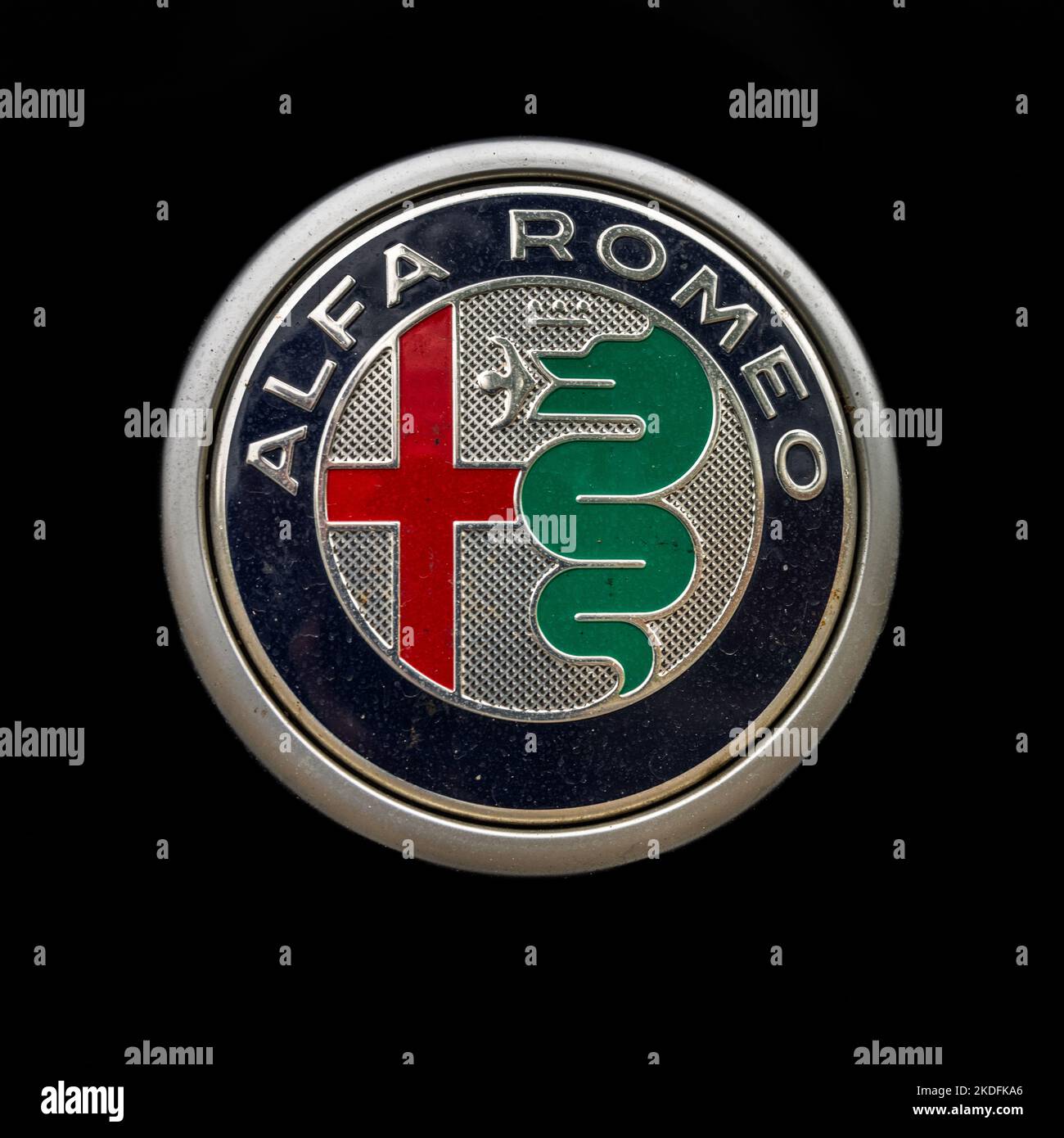 Alfa Romeo badge on a black background Stock Photo - Alamy