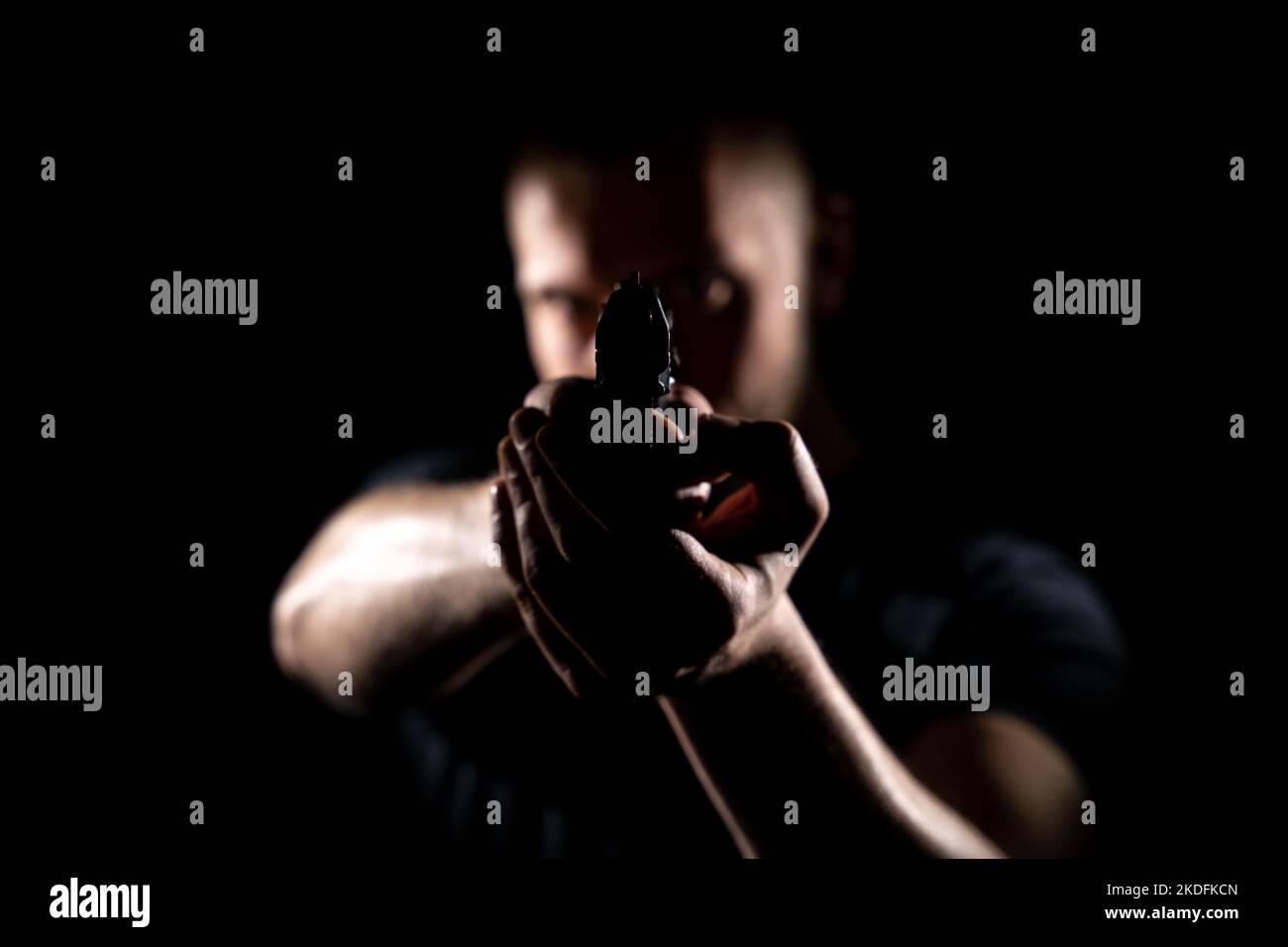 Man pointing gun at camera hi-res stock photography and images - Alamy
