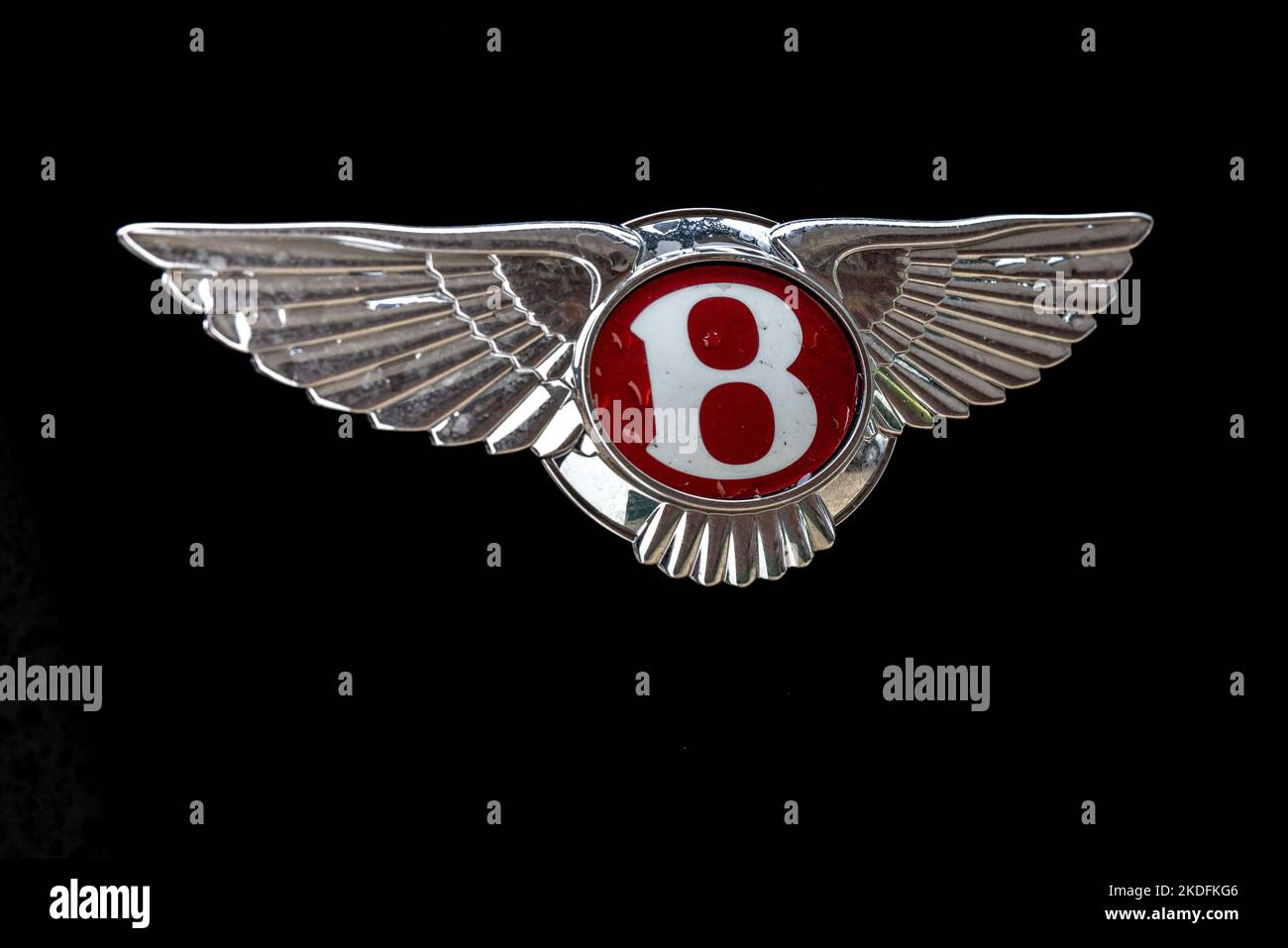 Bentley Continental GT S red wings badge on a black background Stock ...