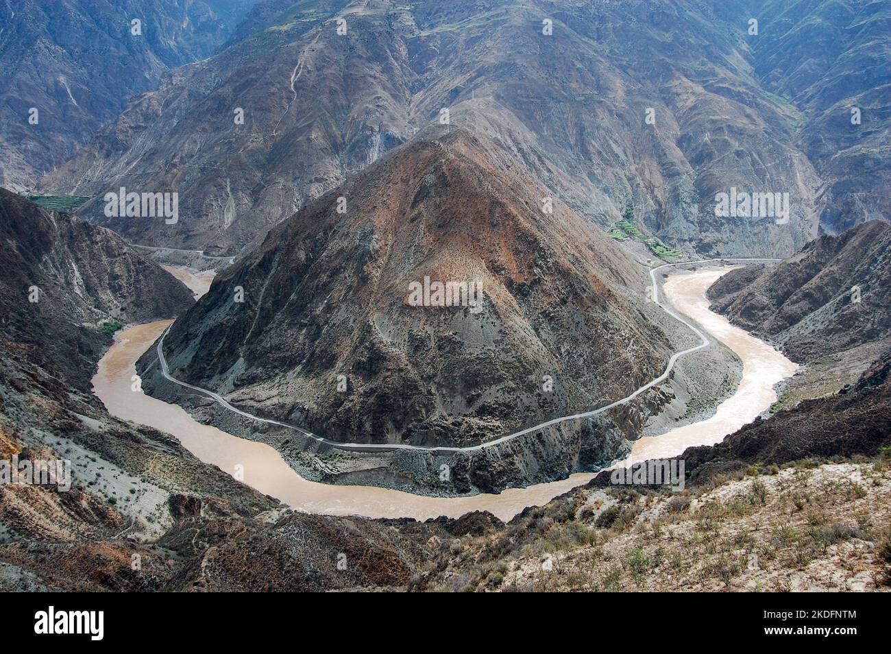 An aerial of Jinsha river with misty mountains background Stock Photo ...