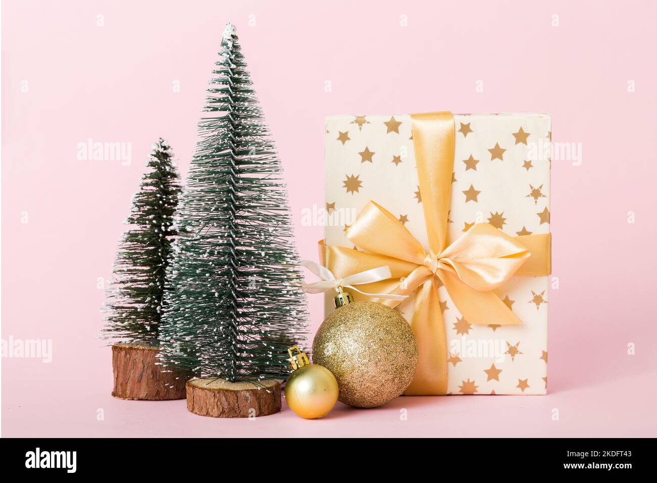 Christmas composition. craft Gift box, small tree, branches and craft ...