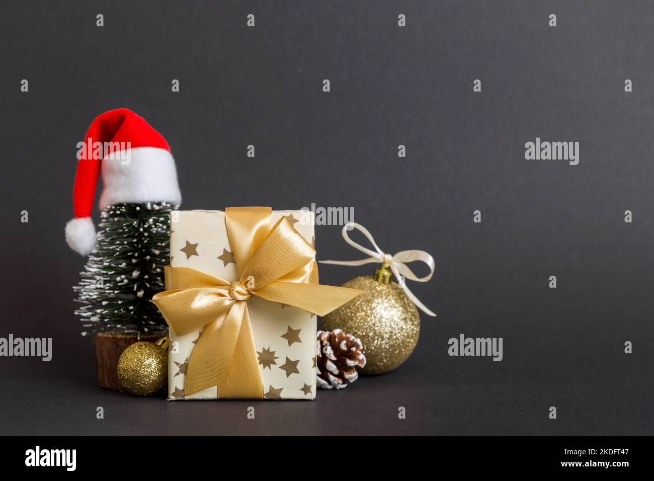 Christmas composition. craft Gift box, small tree, branches and craft ...