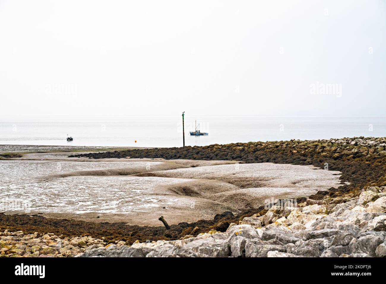 View across Morecambe Bay at low tide Stock Photo - Alamy