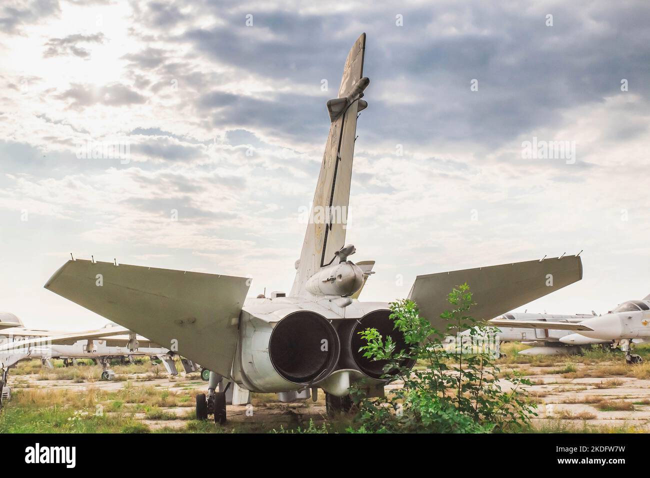 Old jet plane stands at an abandoned airfield Stock Photo - Alamy