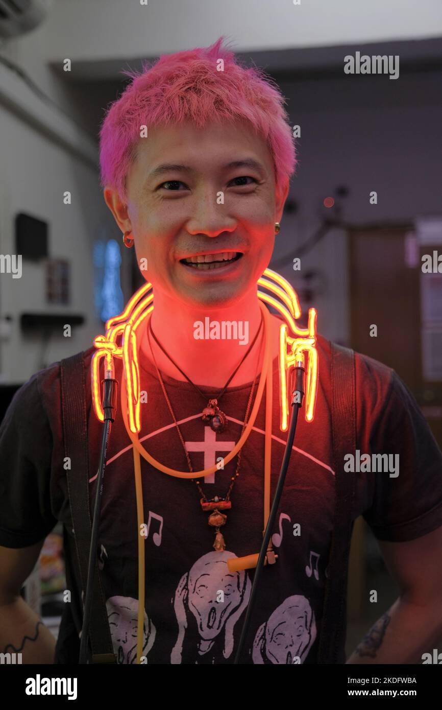 Jive Lau Ho-fai (pink hair) teaches a neon bending workshop to writer ...