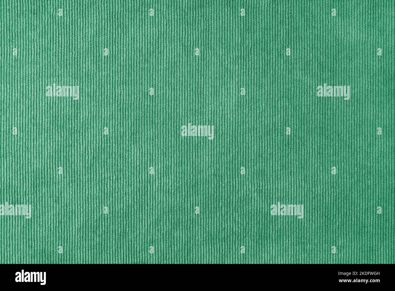 Texture background of velours green fabric. Upholstery velveteen ...