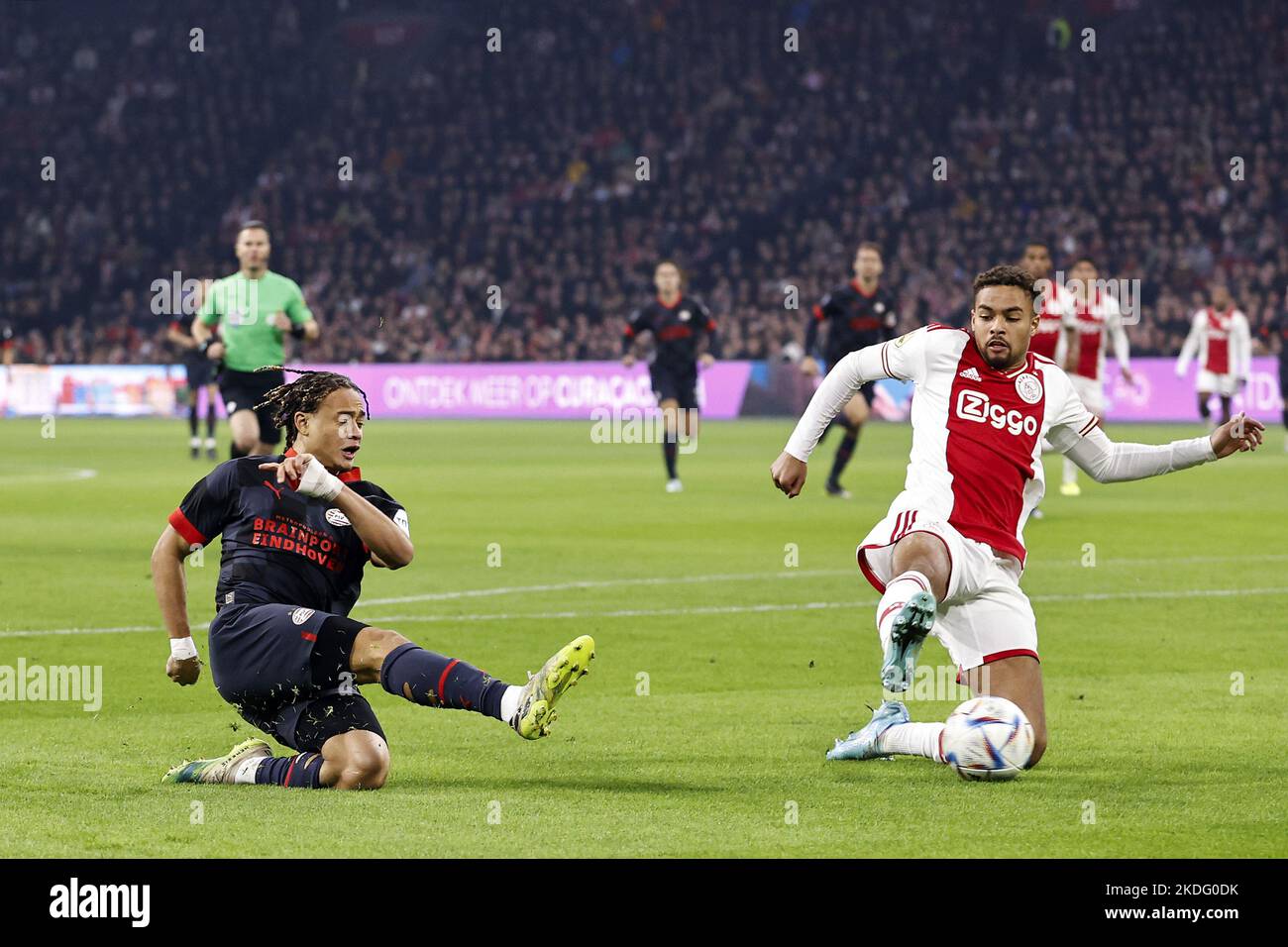 AMSTERDAM - (LR) Xavi Simons of PSV Eindhoven, Devyne Rensch of Ajax during the Dutch Eredivisie ...