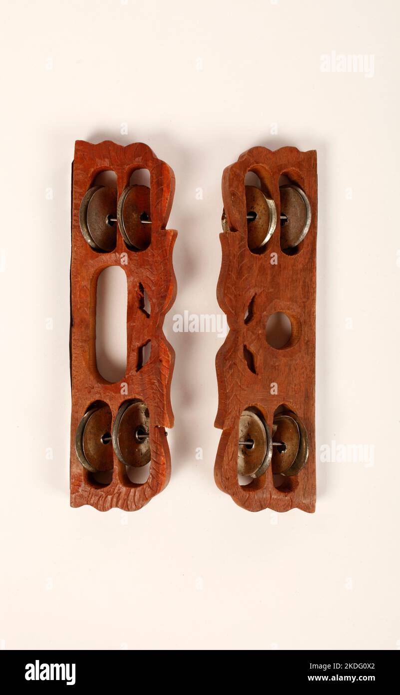 Wooden Khartals, idiophone with jingles in a wooden frame. Folk ...