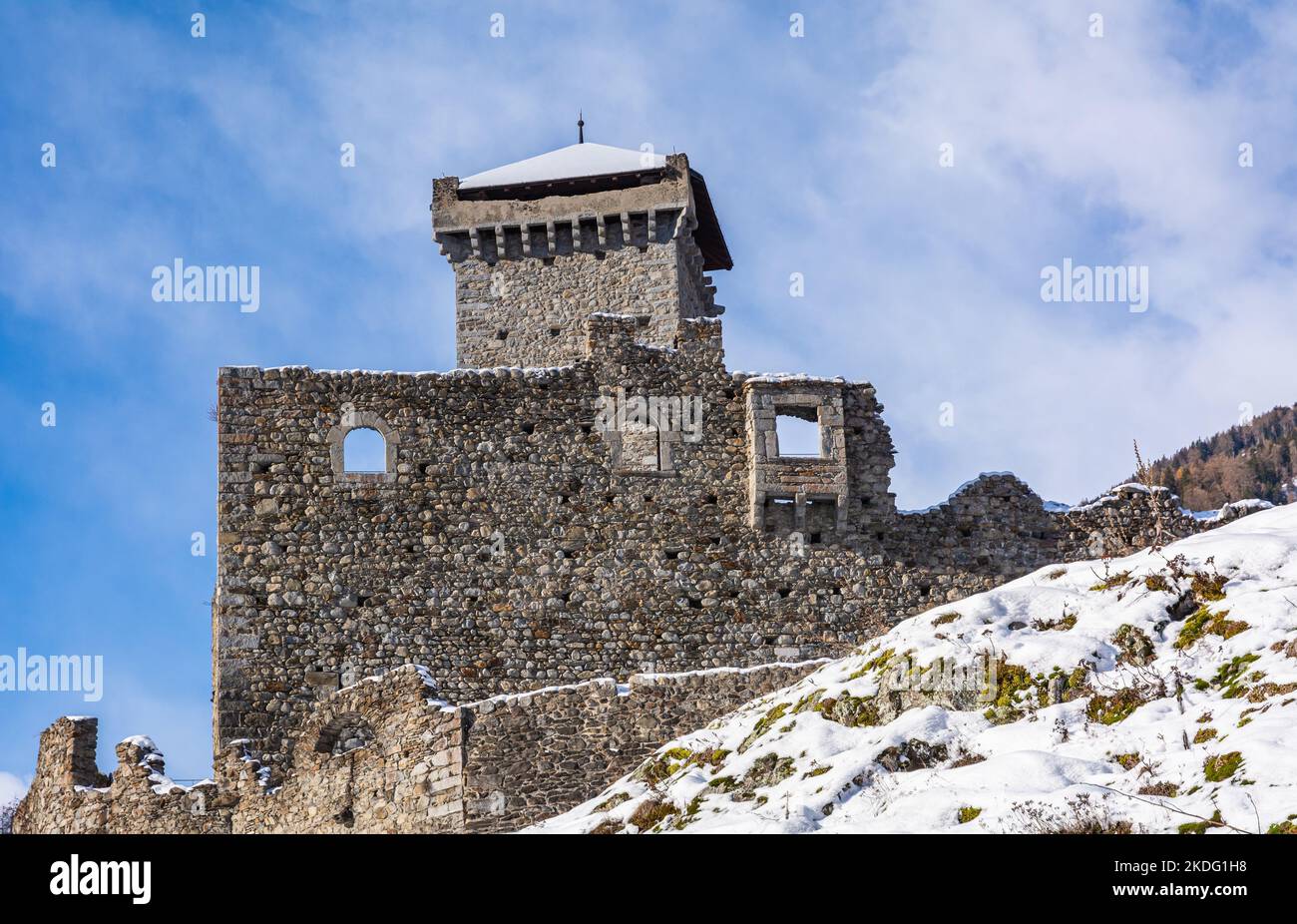 St. Michael castle in Ossana stands on a rocky outcrop. Ossana castle ...