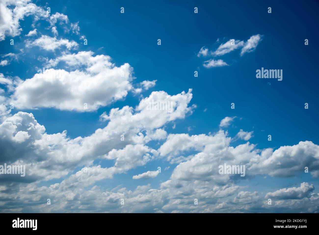 Blue sky with clouds background Stock Photo - Alamy