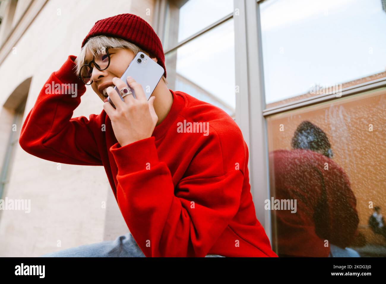 Asian teen boy talking hi-res stock photography and images - Alamy